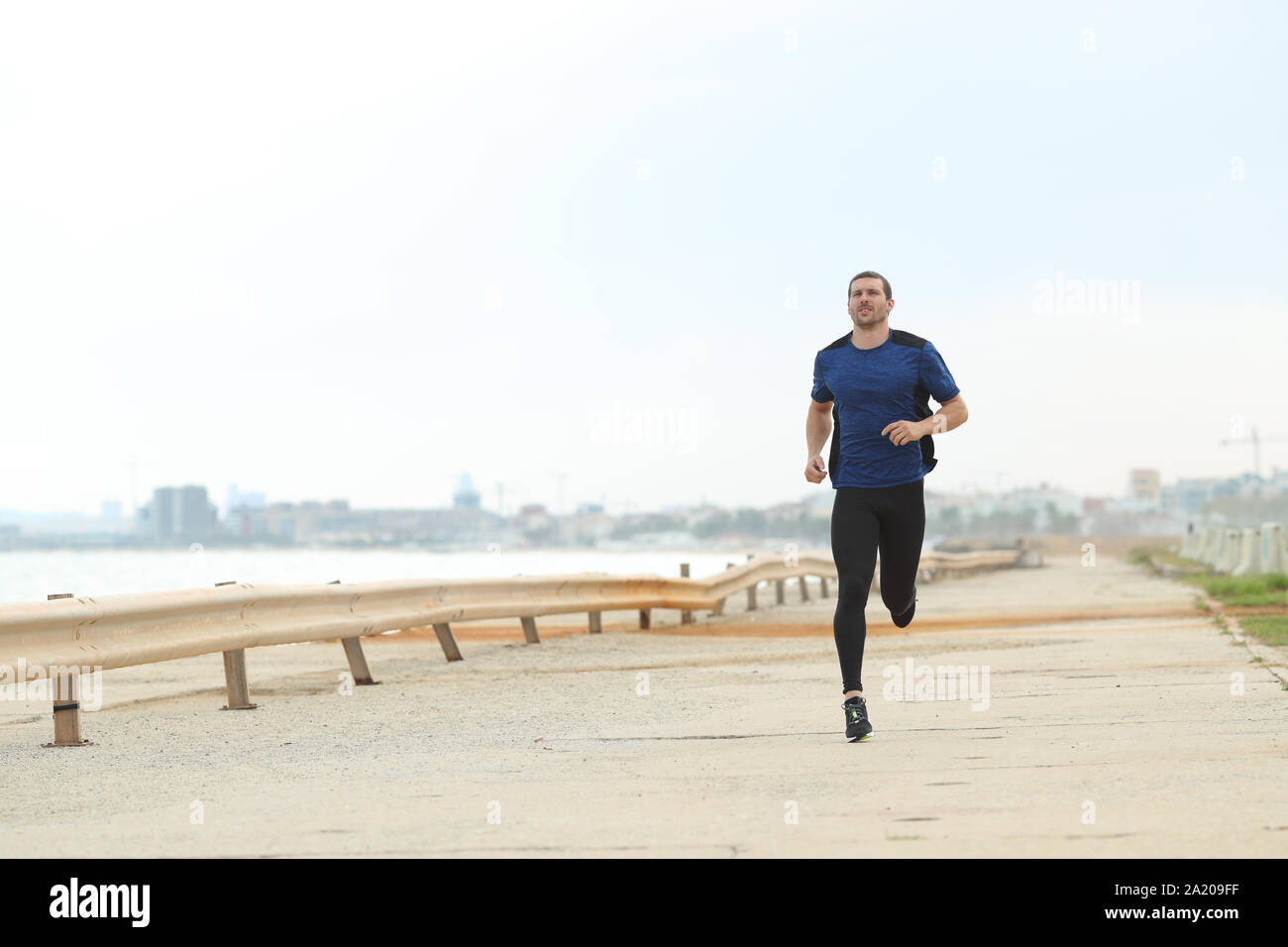 Man running towards camera hi-res stock photography and images - Alamy