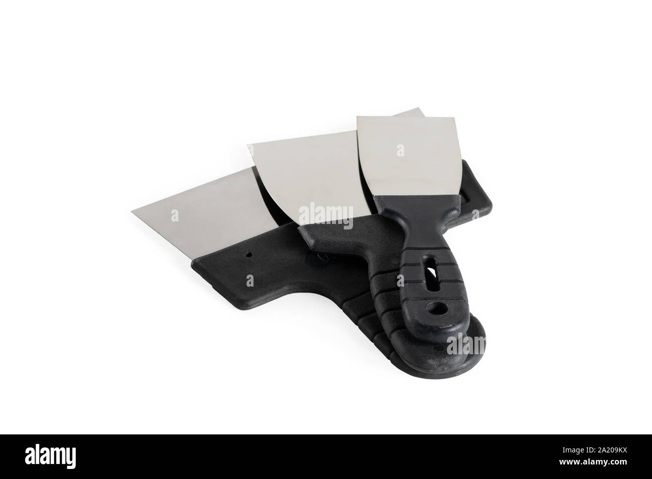 Set of spatulas for finishing work. Close-up. Isolated over white ...