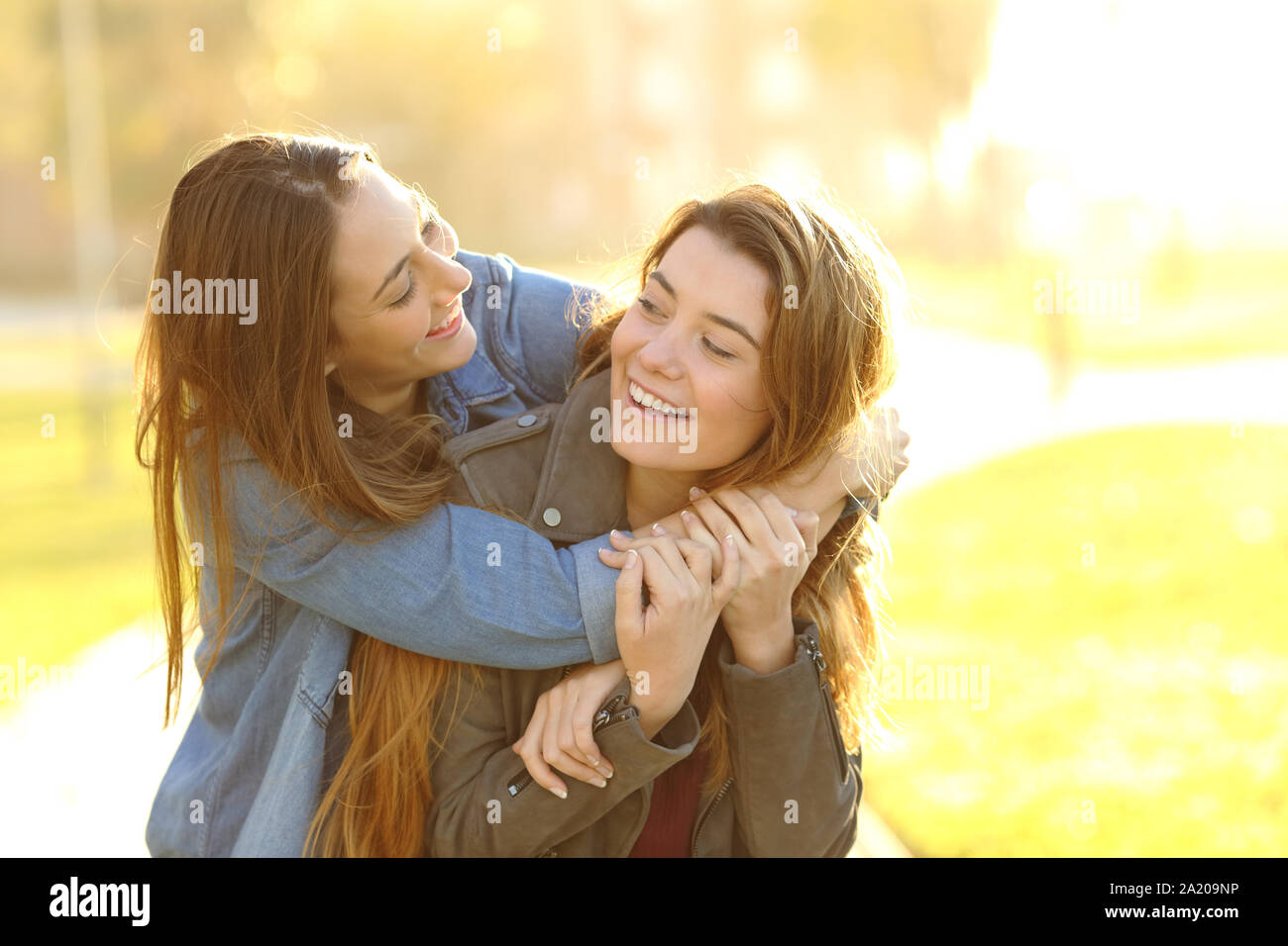 Teenage couple in love cuddling hi-res stock photography and images - Alamy