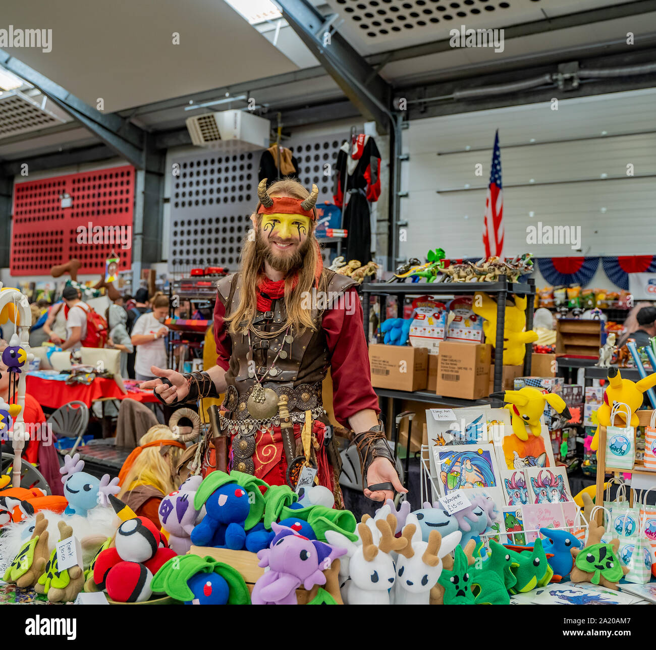 A toy stall vendor dressed up as fantasy character at the annual Nor ...