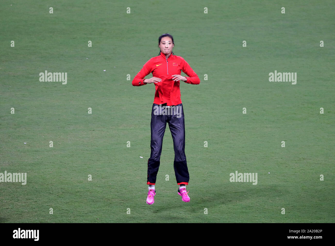 Doha, Qatar. 29th Sep, 2019. Li Ling of China warms up during the women ...