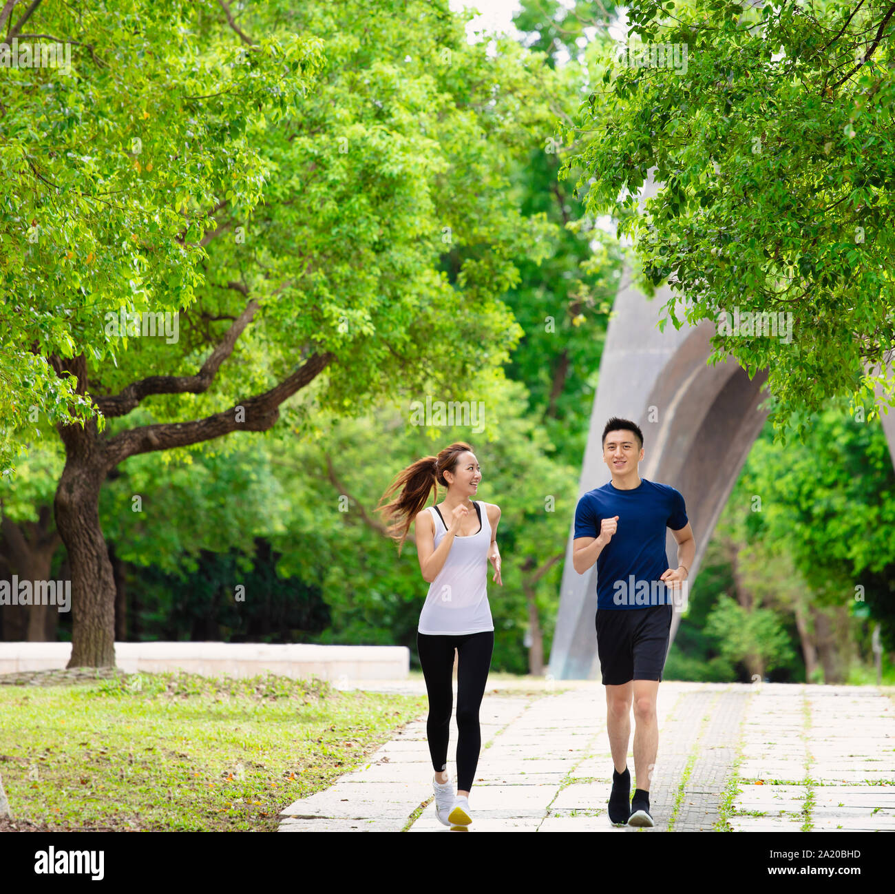 Running jogging at the park hi-res stock photography and images - Alamy