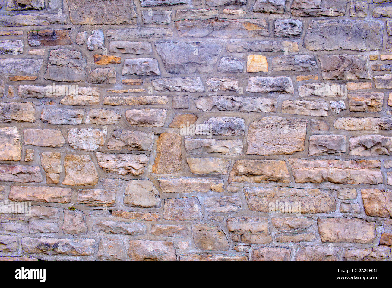 traditional dry stone wall of churchyard in germany with room for copy ...
