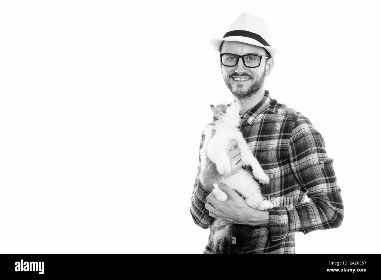 Man holding cat Black and White Stock Photos & Images - Alamy