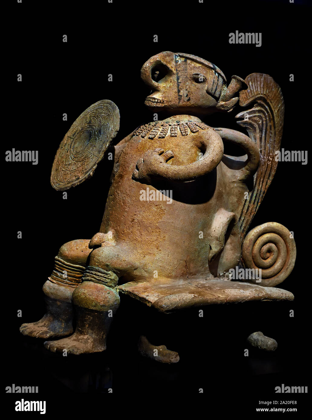 Statuette of warrior sitting on a bench 1000 - 1600 Culture Cauca ...