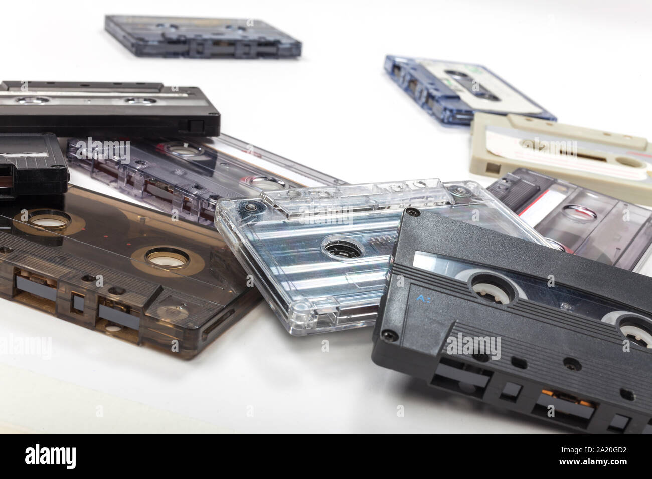 Pile of compact audio cassette tapes on a white background Stock Photo ...