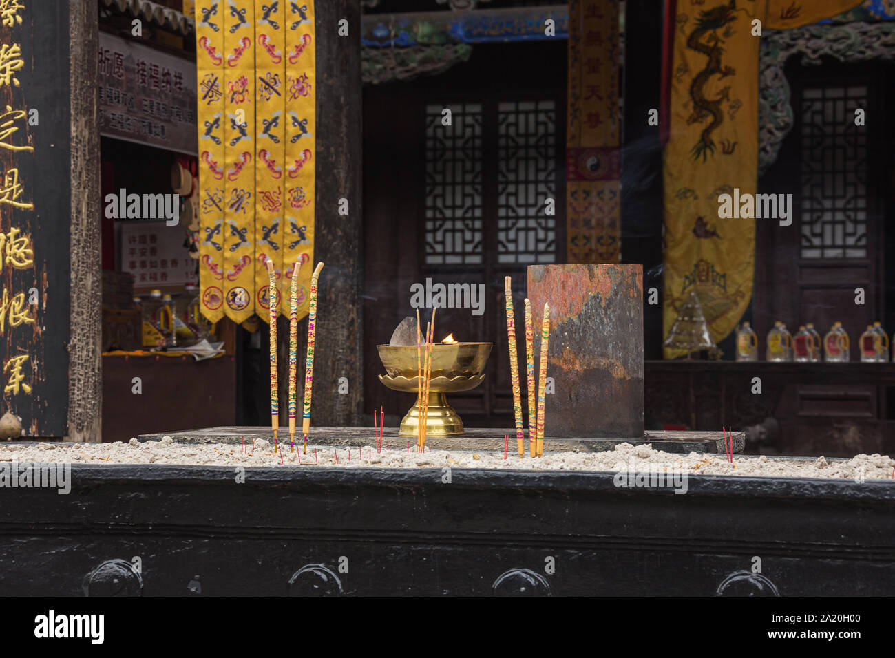 Burning incense in the City God Temple in the old town of Pingyao Stock ...