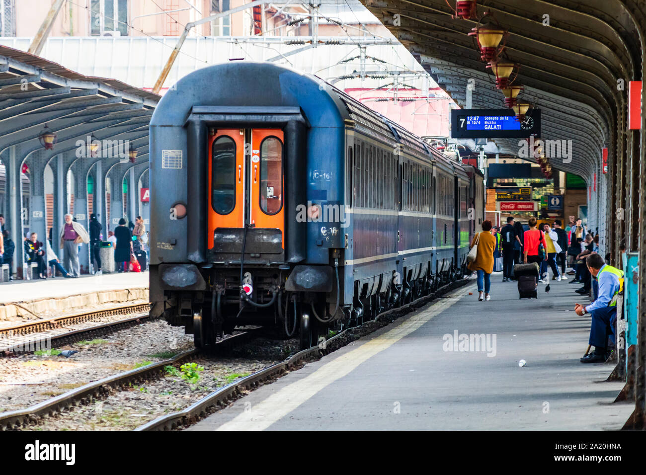 Trains and people waiting at Bucharest North train station (Gara de ...
