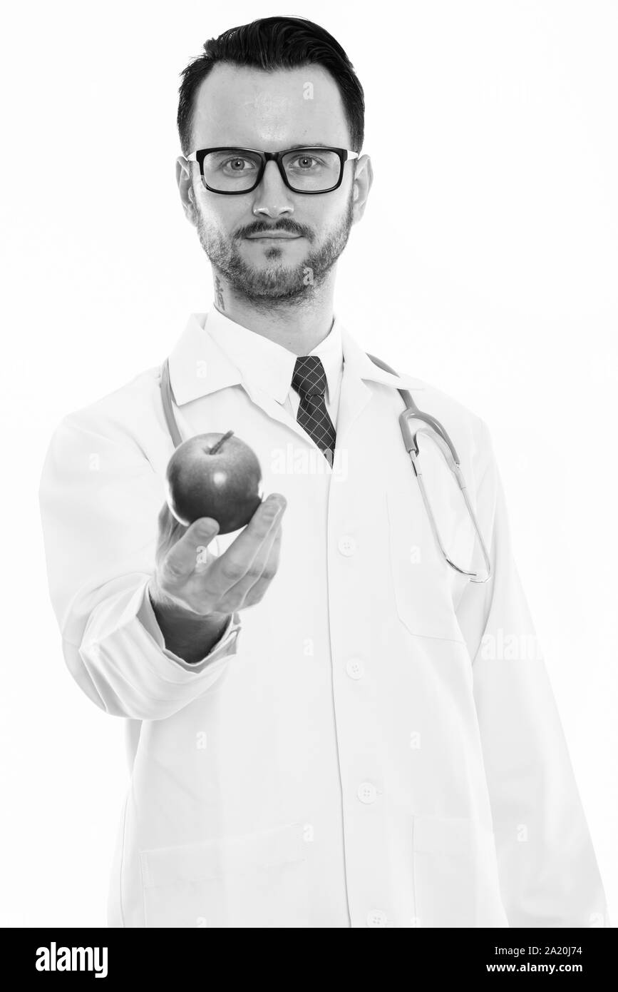 Doctor giving shot to man Black and White Stock Photos & Images - Alamy