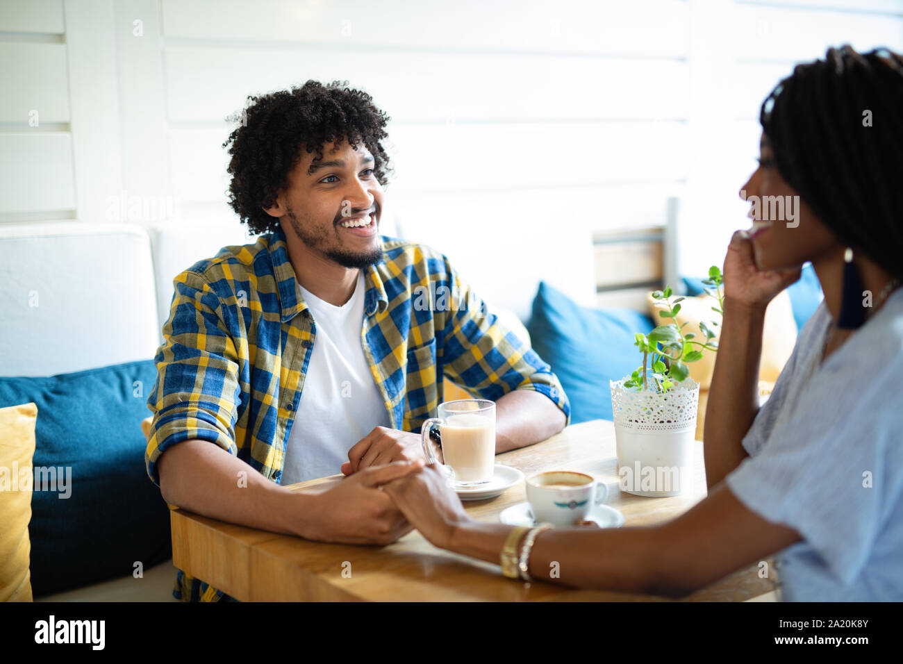 Two people in cafe enjoying the time spending with each other Stock ...