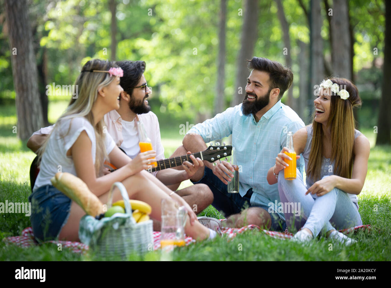 Cheerful group friends camping in hi-res stock photography and images - Alamy