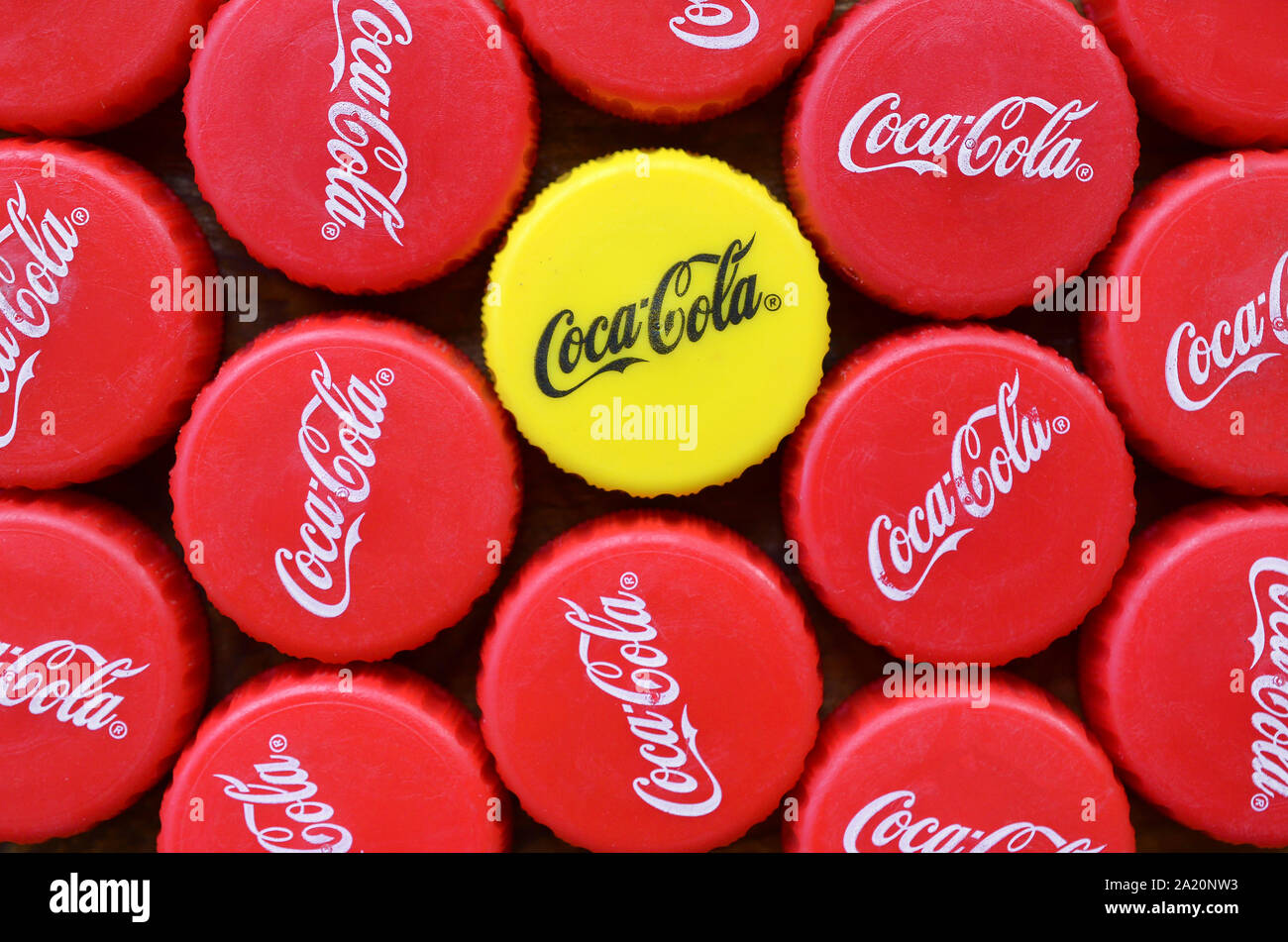 KHARKOV, UKRAINE - SEPTEMBER 8, 2019: Many red lids and one yellow ...