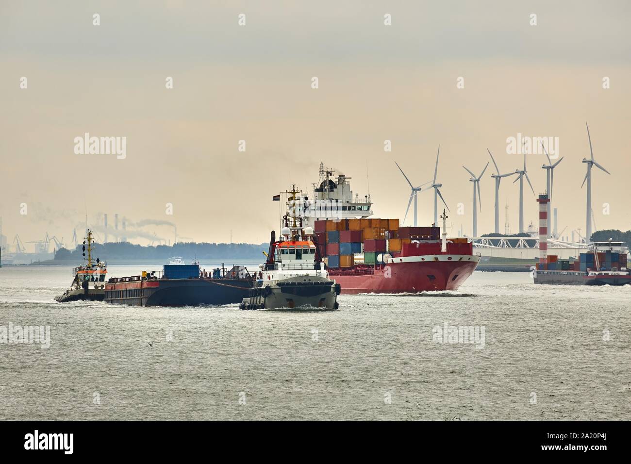 Ship carrying containers through Rotterdam Stock Photo - Alamy