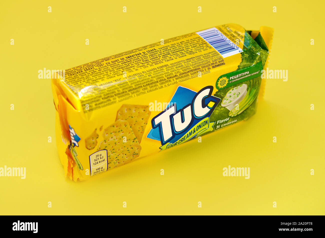 KHARKOV, UKRAINE - SEPTEMBER 23, 2019: Tuc snack pack on bright yellow ...