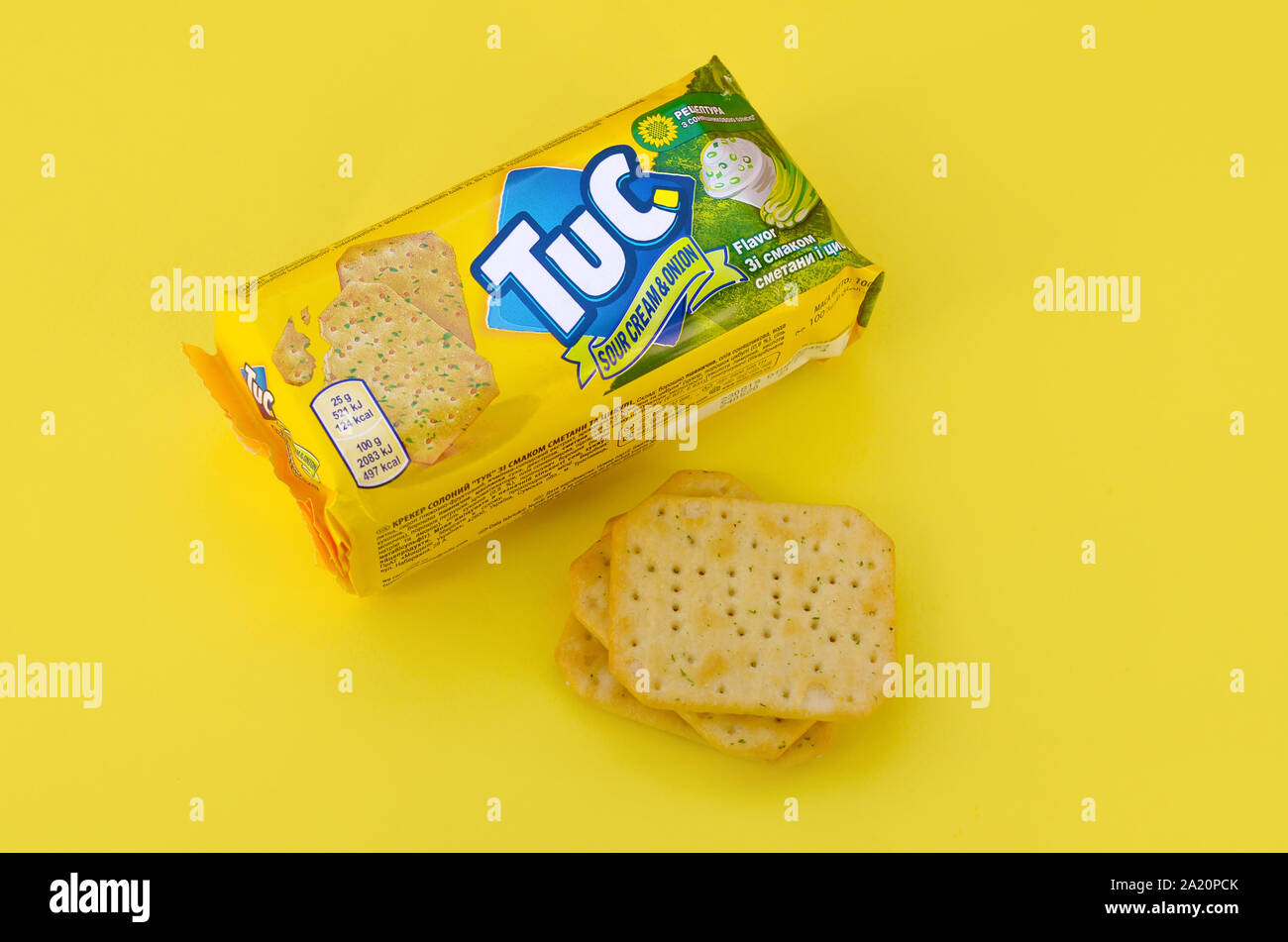 KHARKOV, UKRAINE - SEPTEMBER 23, 2019: Tuc snack pack on bright yellow ...