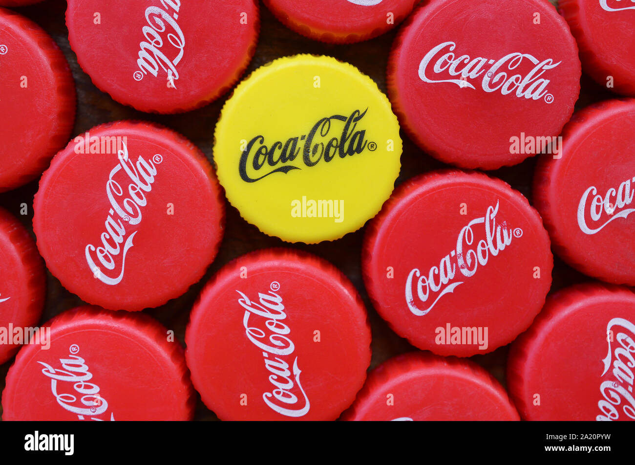 KHARKOV, UKRAINE - SEPTEMBER 8, 2019: Many red lids and one yellow ...
