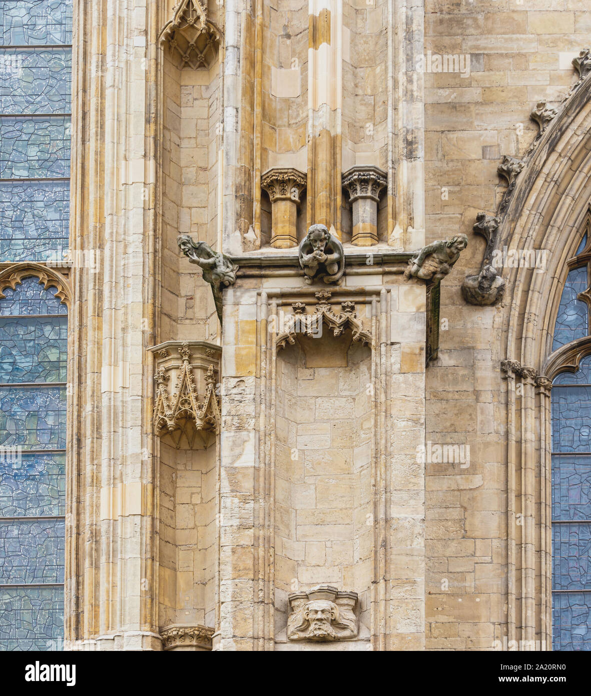 Gargoyles on the east end of York Minster. The column sits beside the ...