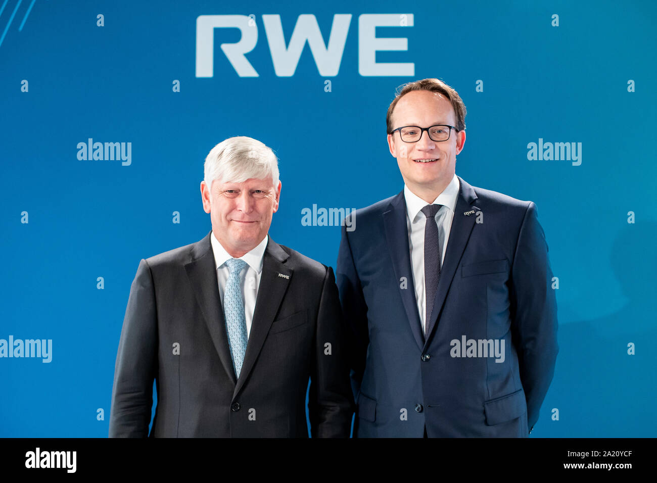 Essen, Germany. 30th Sep, 2019. Rolf Martin Schmitz (l), CEO of RWE and ...