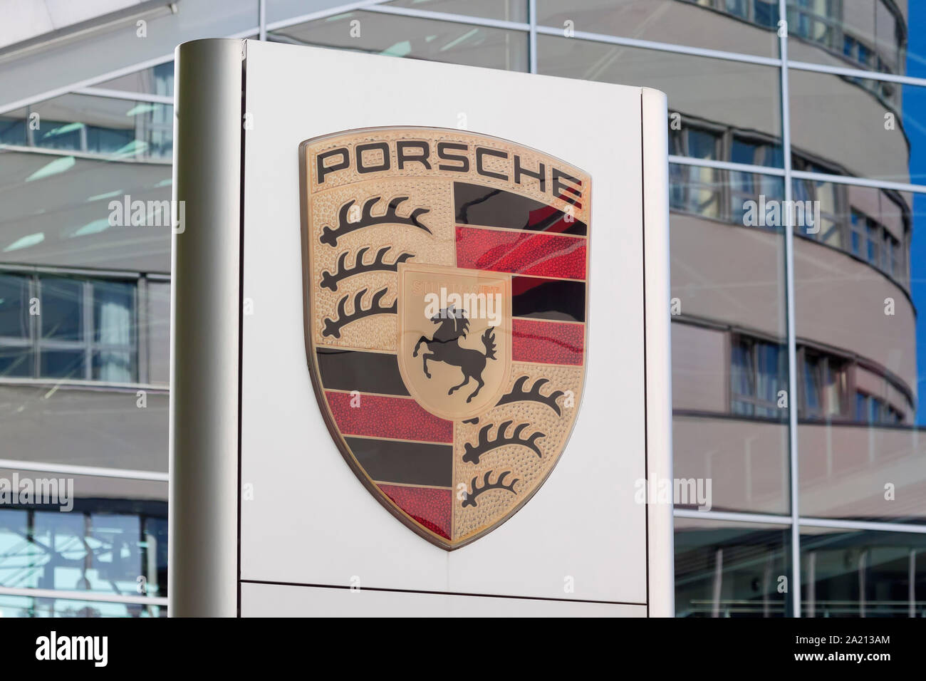 Sign of Porsche in Berlin Stock Photo - Alamy