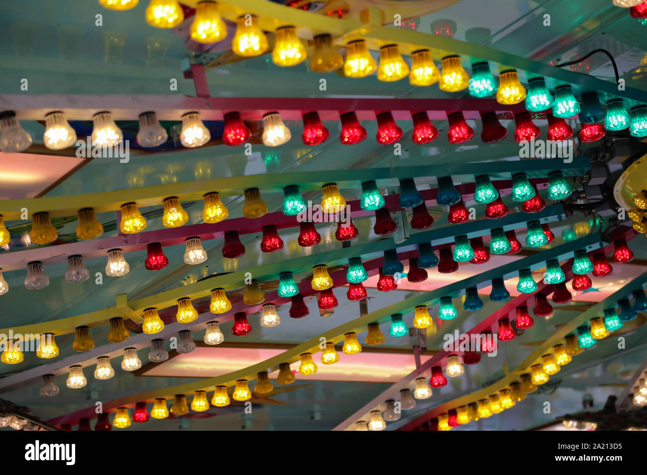 Multicolored lamps and Light illumination on the carousel Stock Photo ...