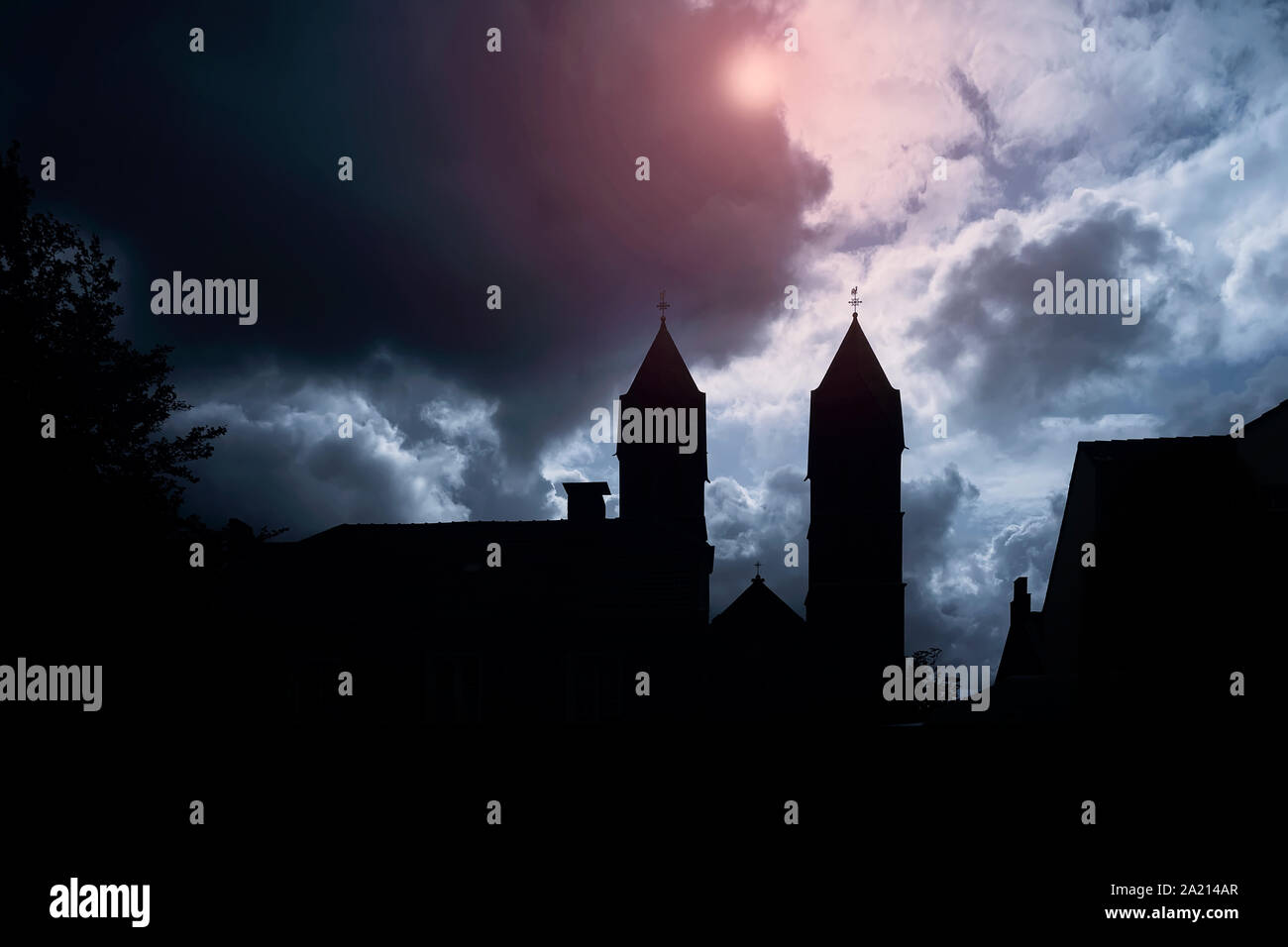 Silhouette of medieval castle and the cathedral church, night over dark ...