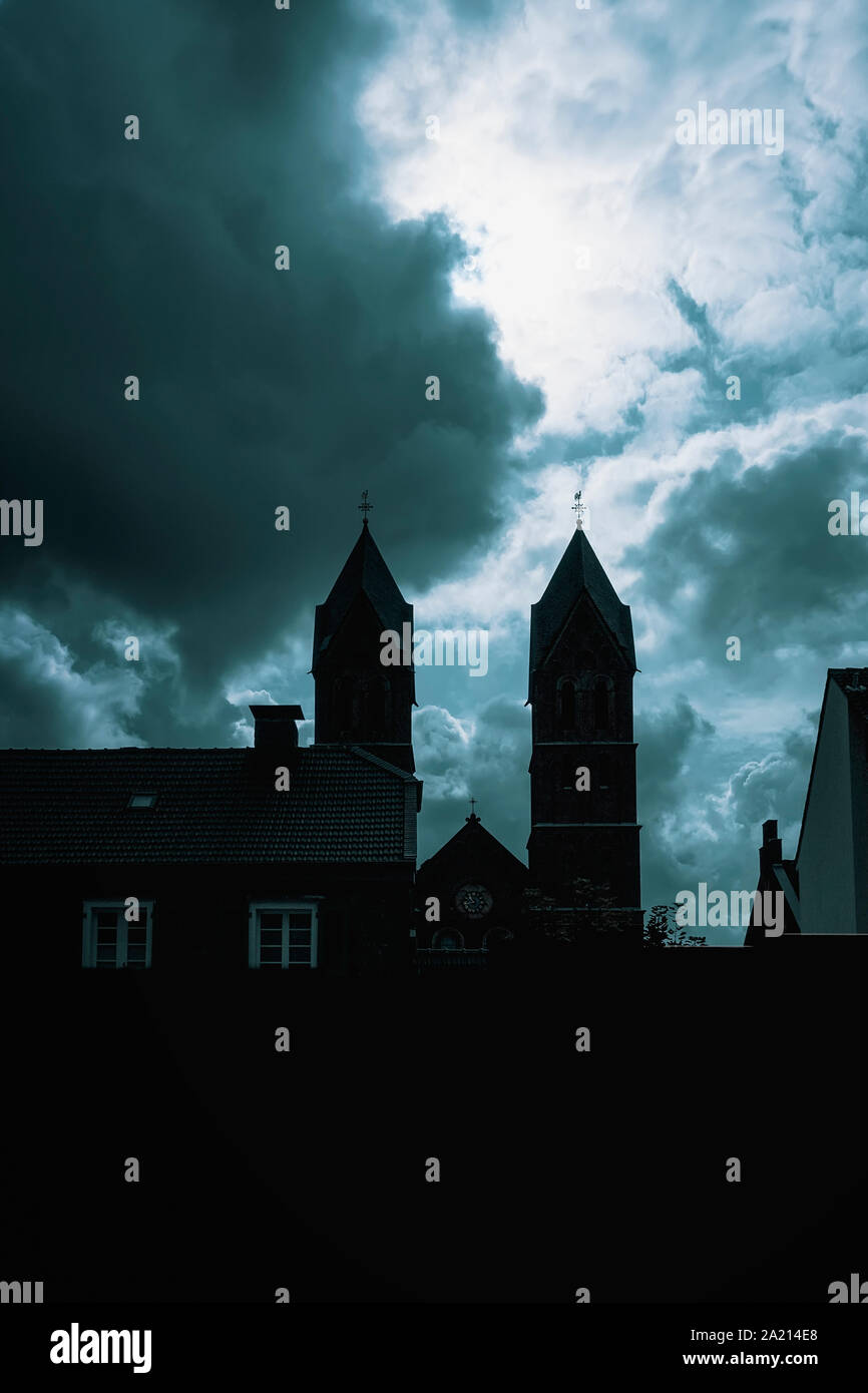 Silhouette of catholic church at night over dark sky background Stock ...