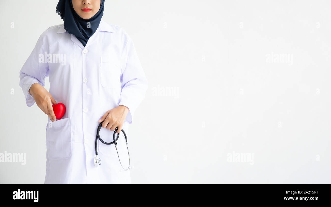 Young Arab Muslim intern doctor women smile on isolate white background ...