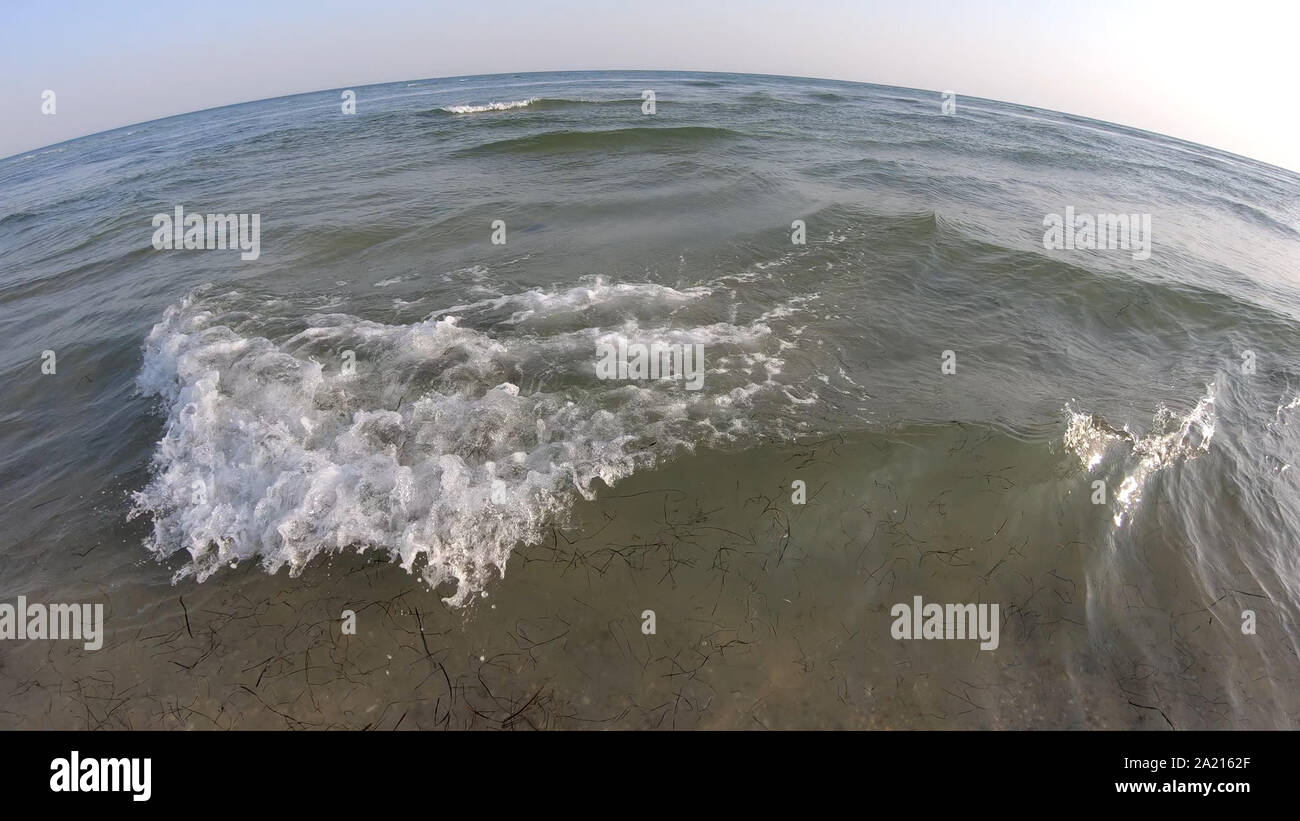 Waving sea sandy shore hi-res stock photography and images - Alamy