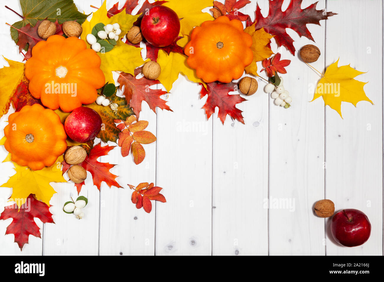 Autumn cozy background with pumpkins and leaves Stock Photo - Alamy