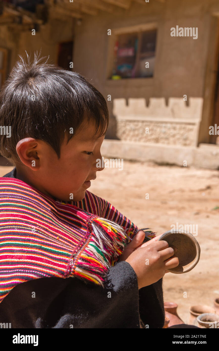 Young boy, aged 4 to 6 at a touristic event in the indigenous village ...