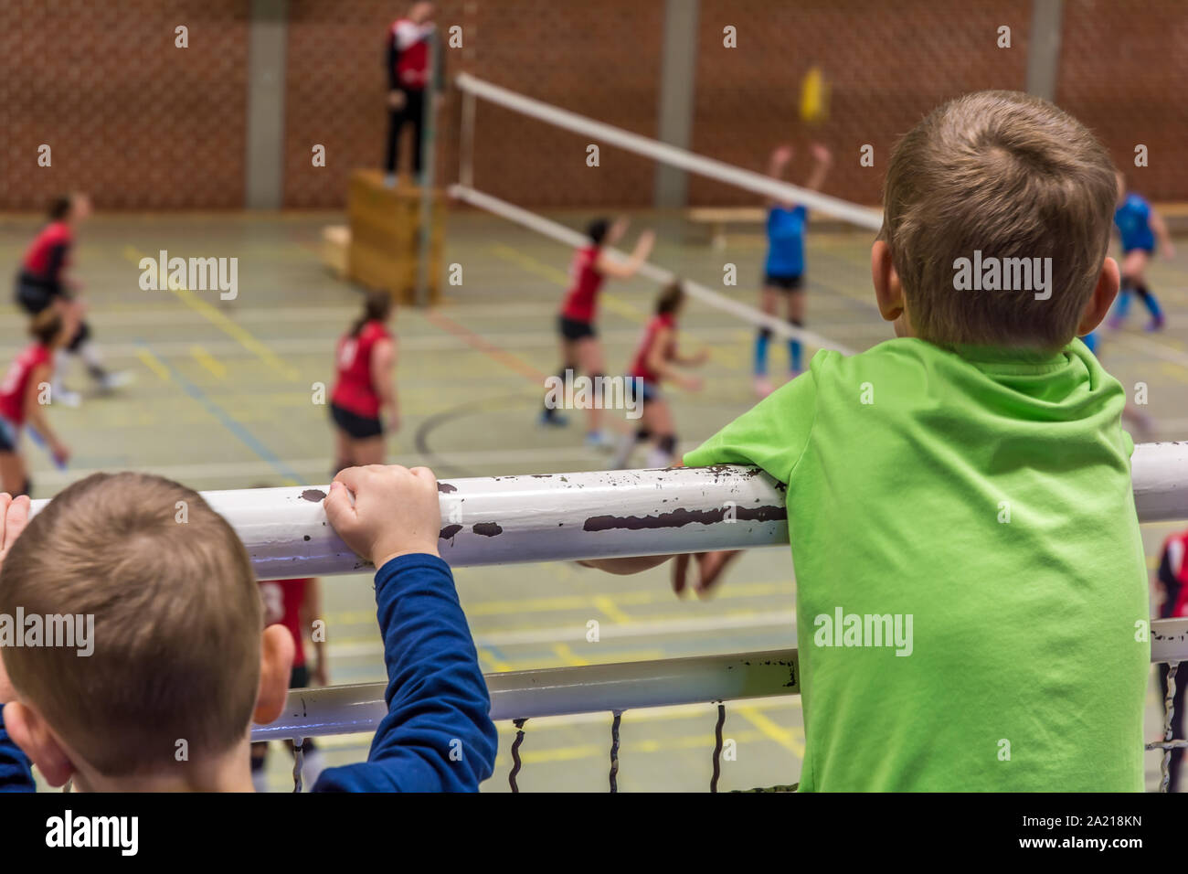 Spectators at volleyball Stock Photo - Alamy
