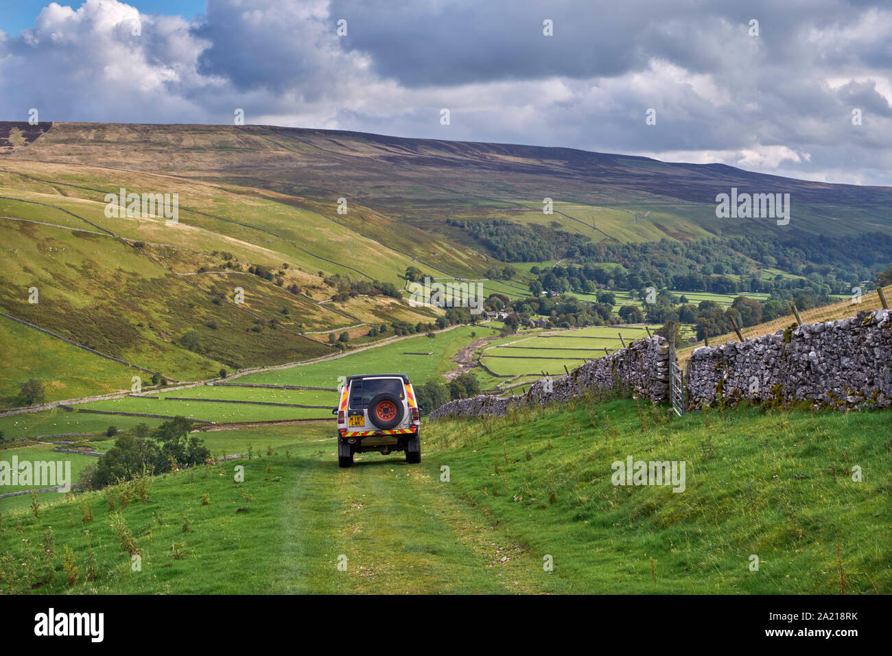 Car on unsurfaced road above Littondale. Litton, Yorkshire Dales ...