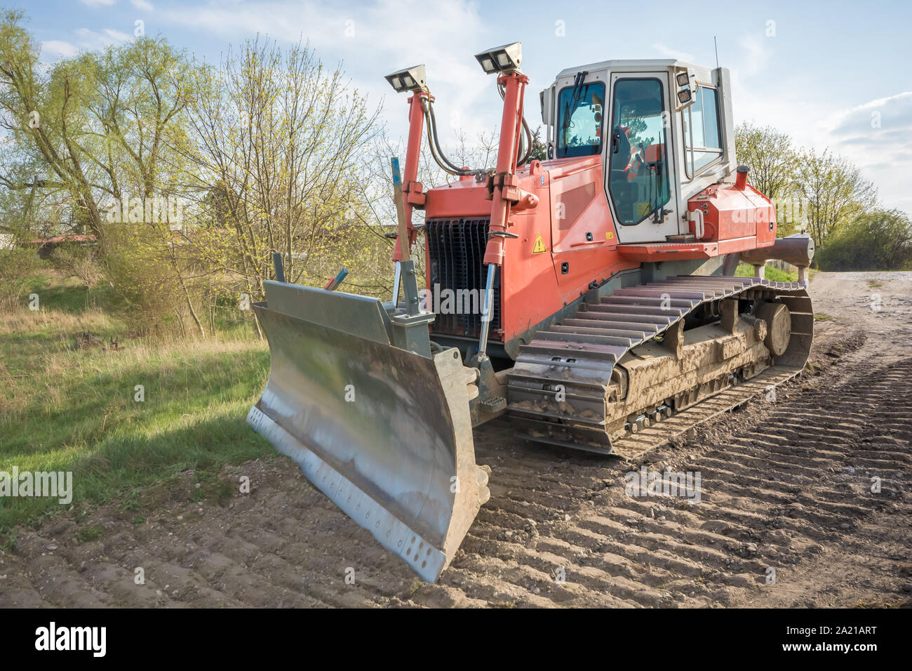Big bulldozer with on a construction site Stock Photo - Alamy