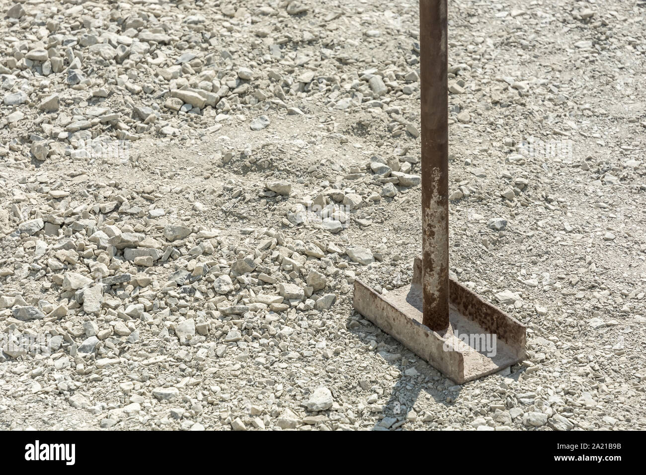 Gravel is compacted with a hand rammer Stock Photo - Alamy
