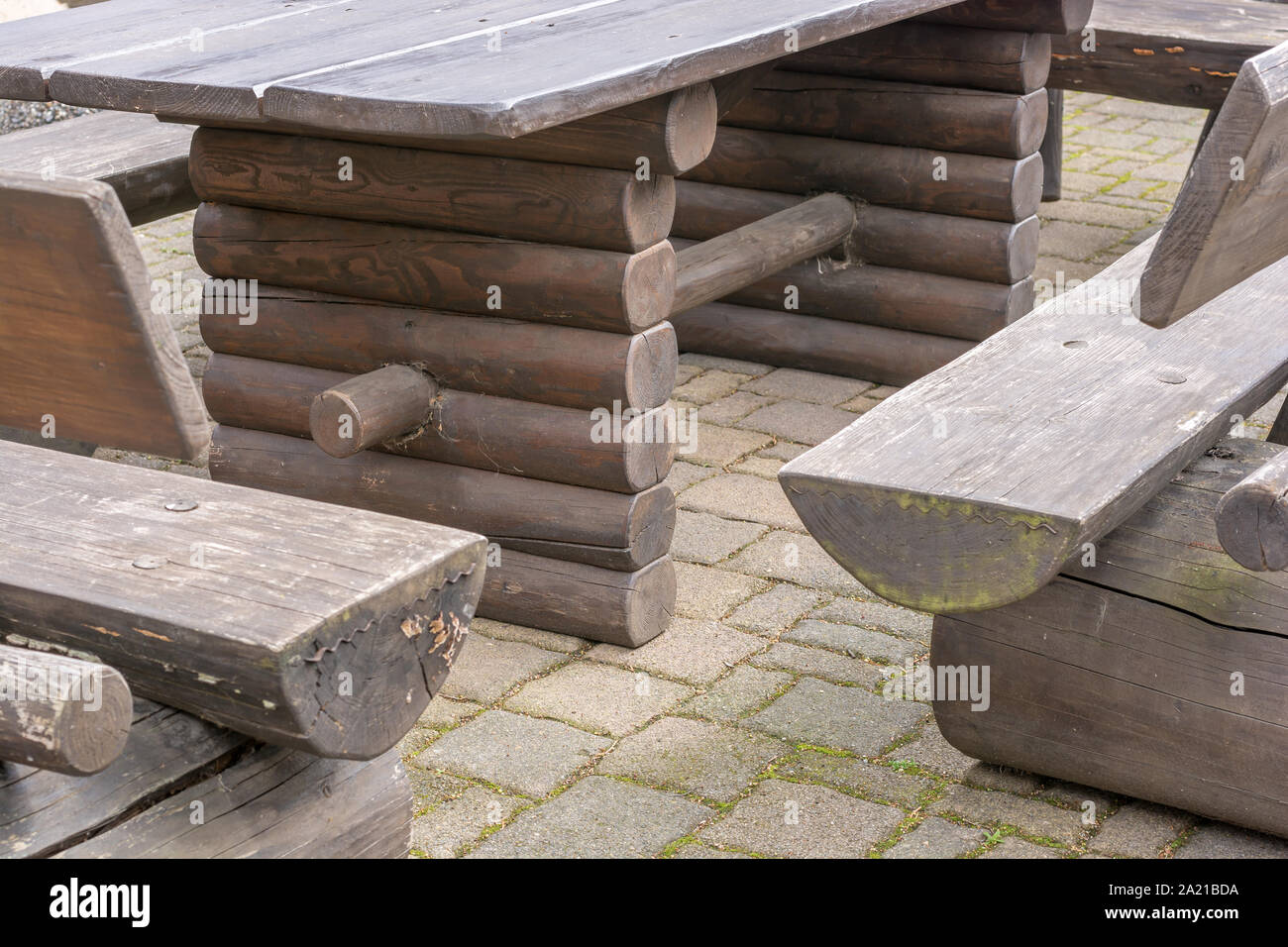 Slightly weathered solid wood garden furniture Stock Photo - Alamy