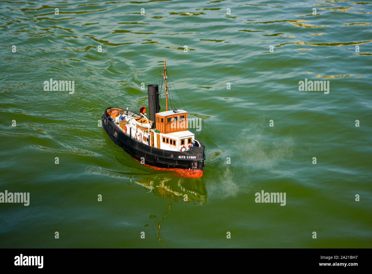 ship,old toy, steamboat swimming on lake Stock Photo - Alamy