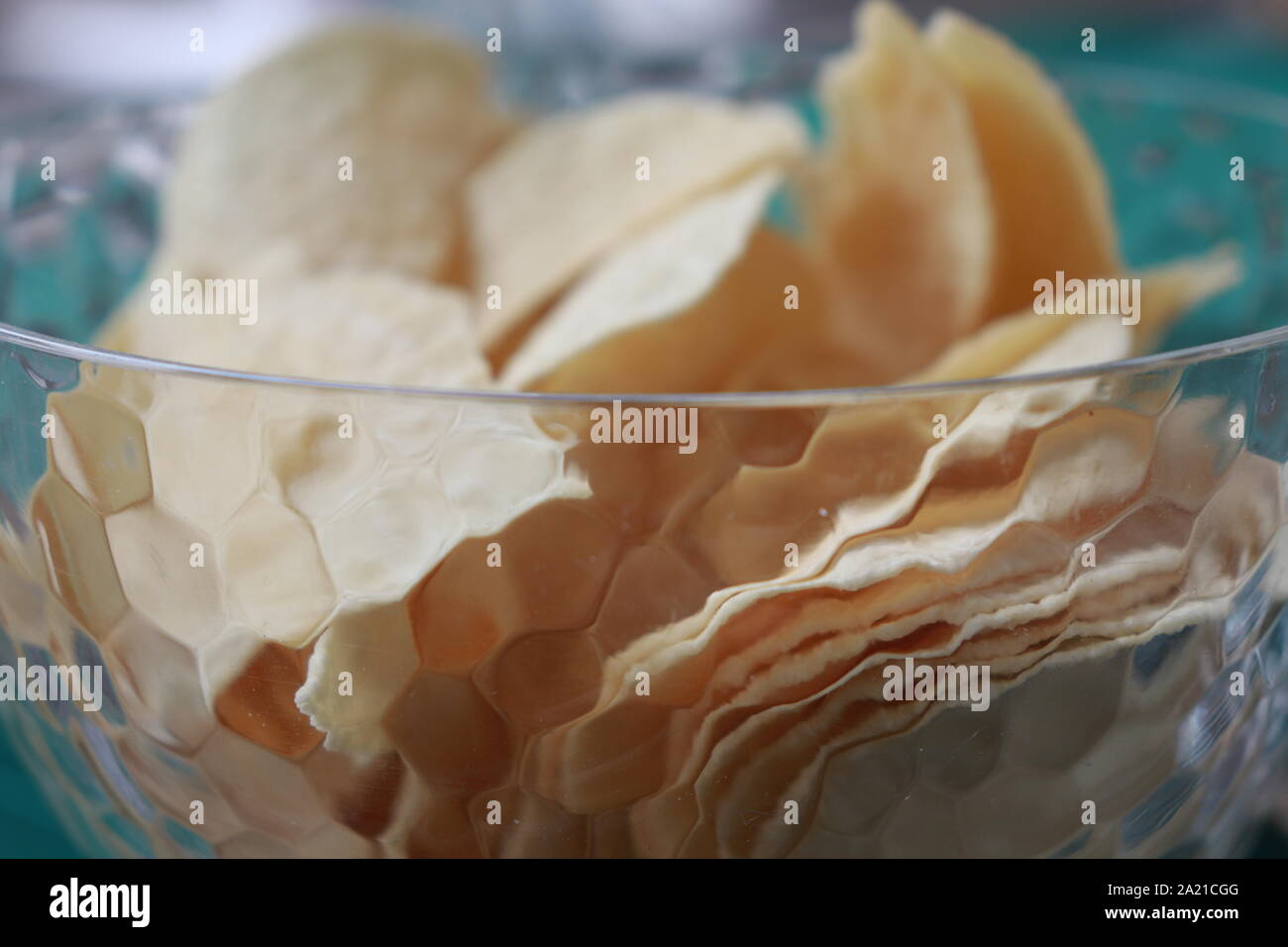 Crisps in transparent bowl Stock Photo - Alamy