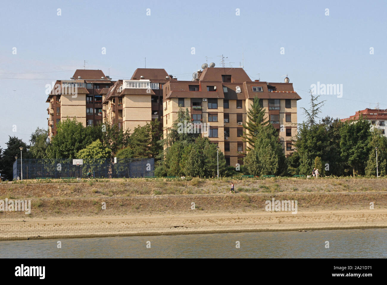 Residential apartments building as seen on the bank of the Danube River ...