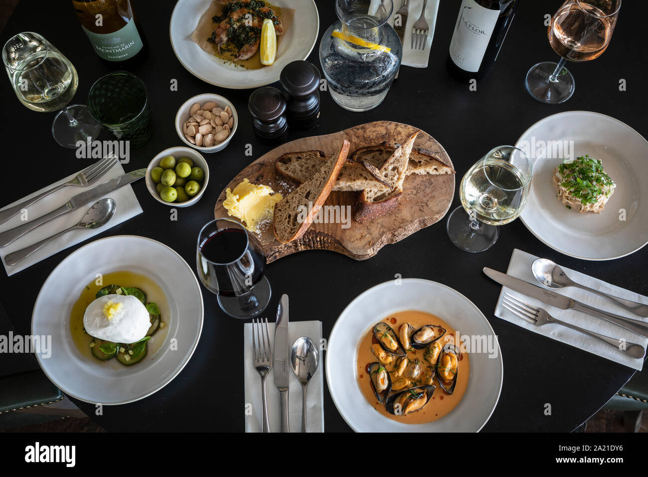 Restaurant table set for lunch Stock Photo - Alamy