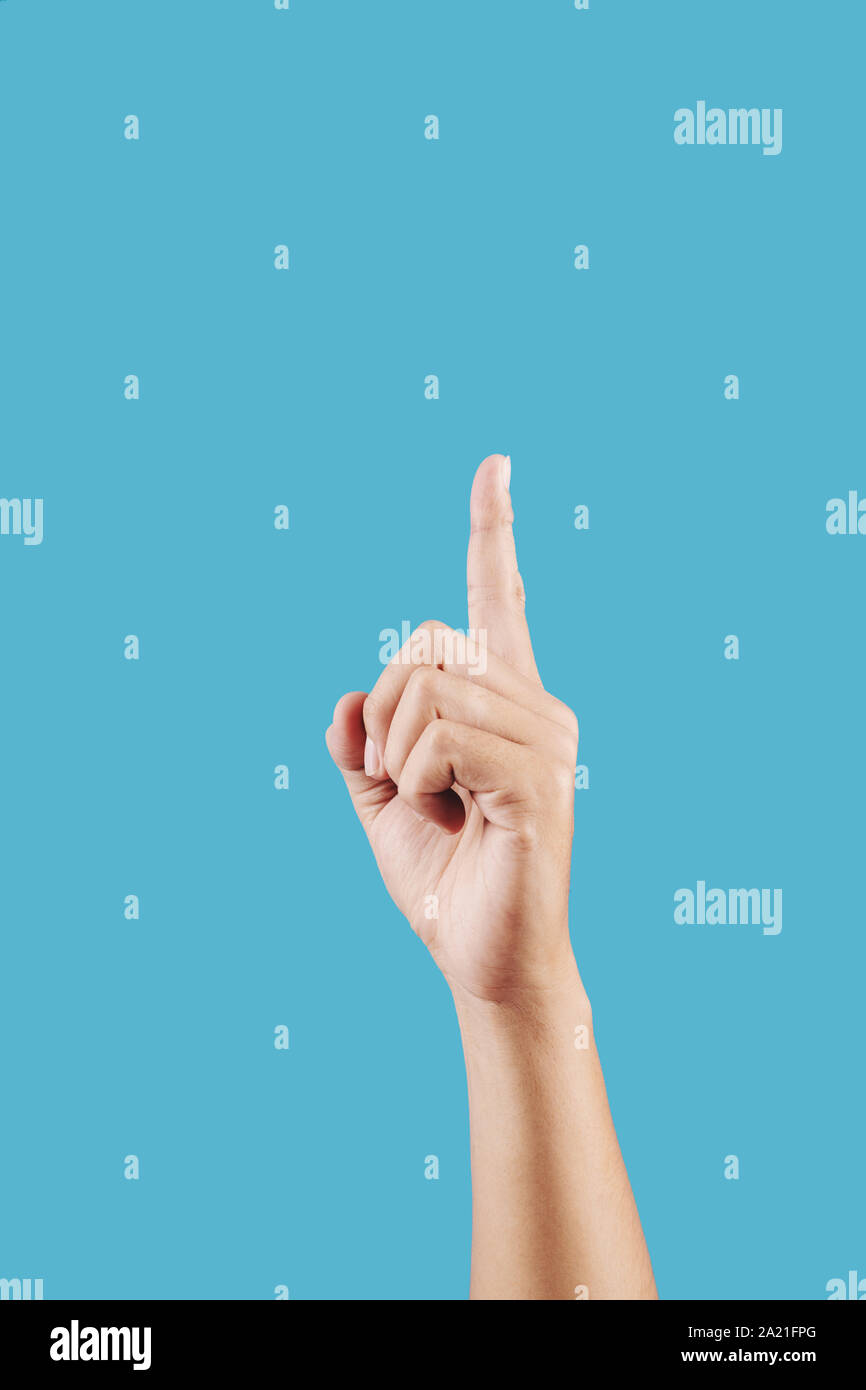 Hand of person pointing up in the air with index finger, isolated on ...