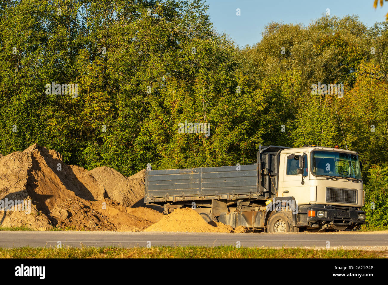 Loading dump truck hi-res stock photography and images - Alamy