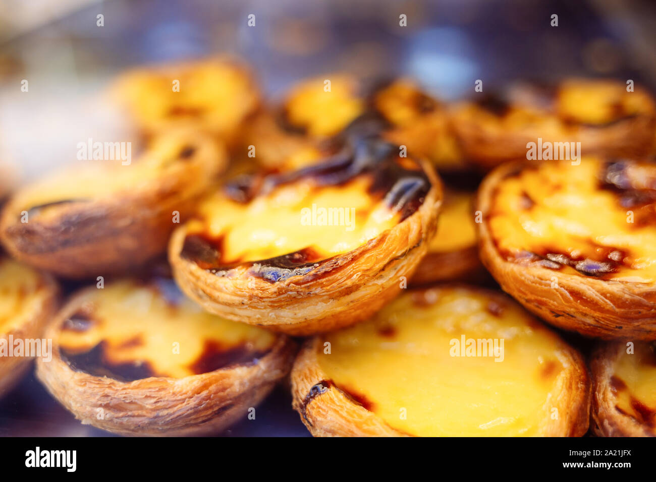 Traditional portuguese dessert - Pastel de nata. Bakery shop window ...