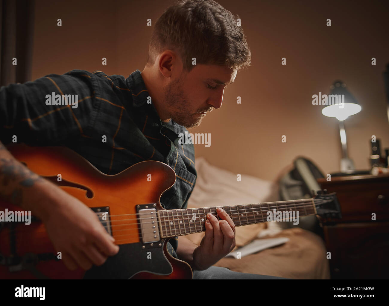 Man sitting up in bed hi-res stock photography and images - Alamy