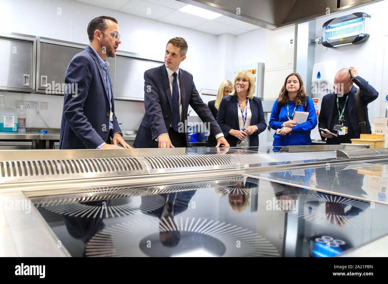 Education Secretary Gavin Williamson (second left) during a visit to ...