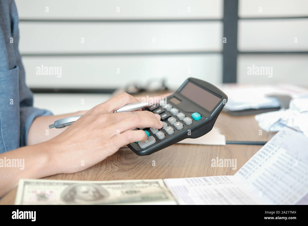 man calculate domestic bills. Businessman with calculator checking ...