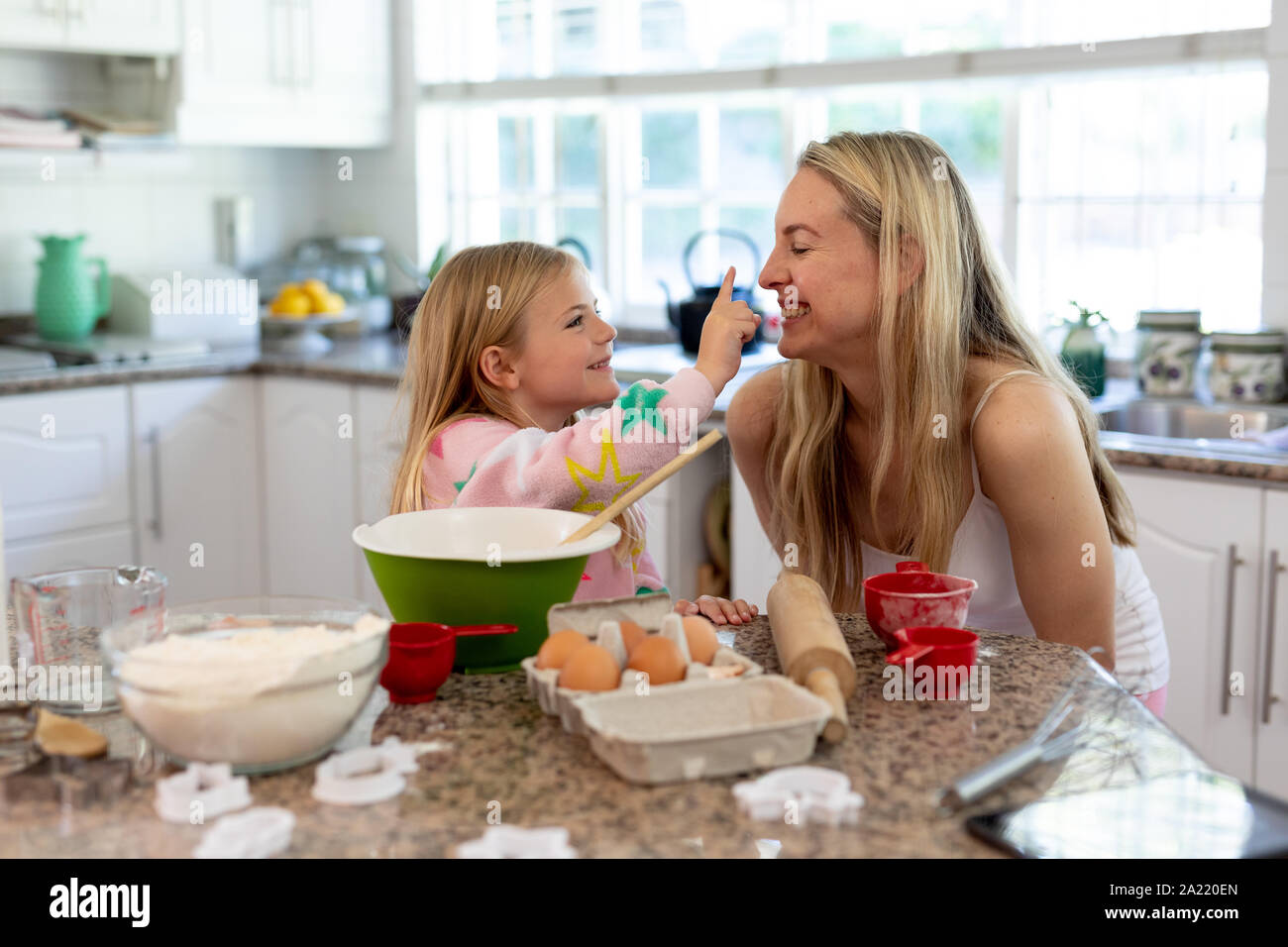 Family making Christmas cookies at home Stock Photo - Alamy