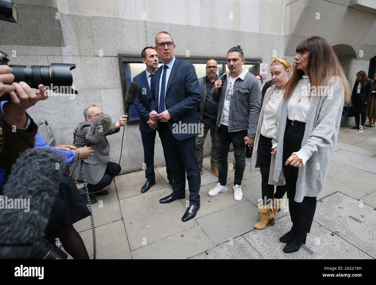 Is flanked by his girlfriend hi-res stock photography and images - Alamy