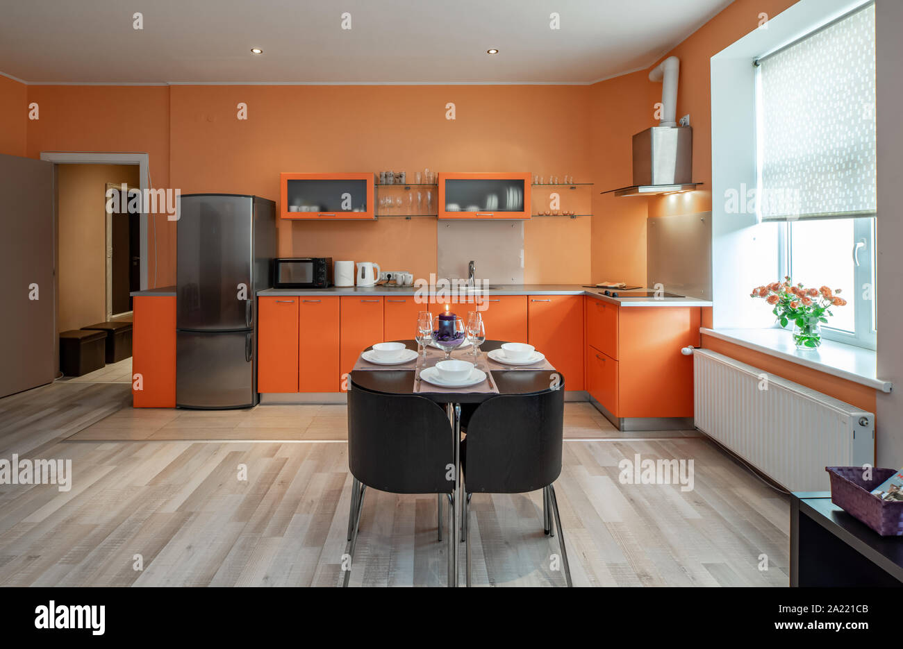 Studio apartment with furniture. Kitchen set. Served table Stock Photo ...