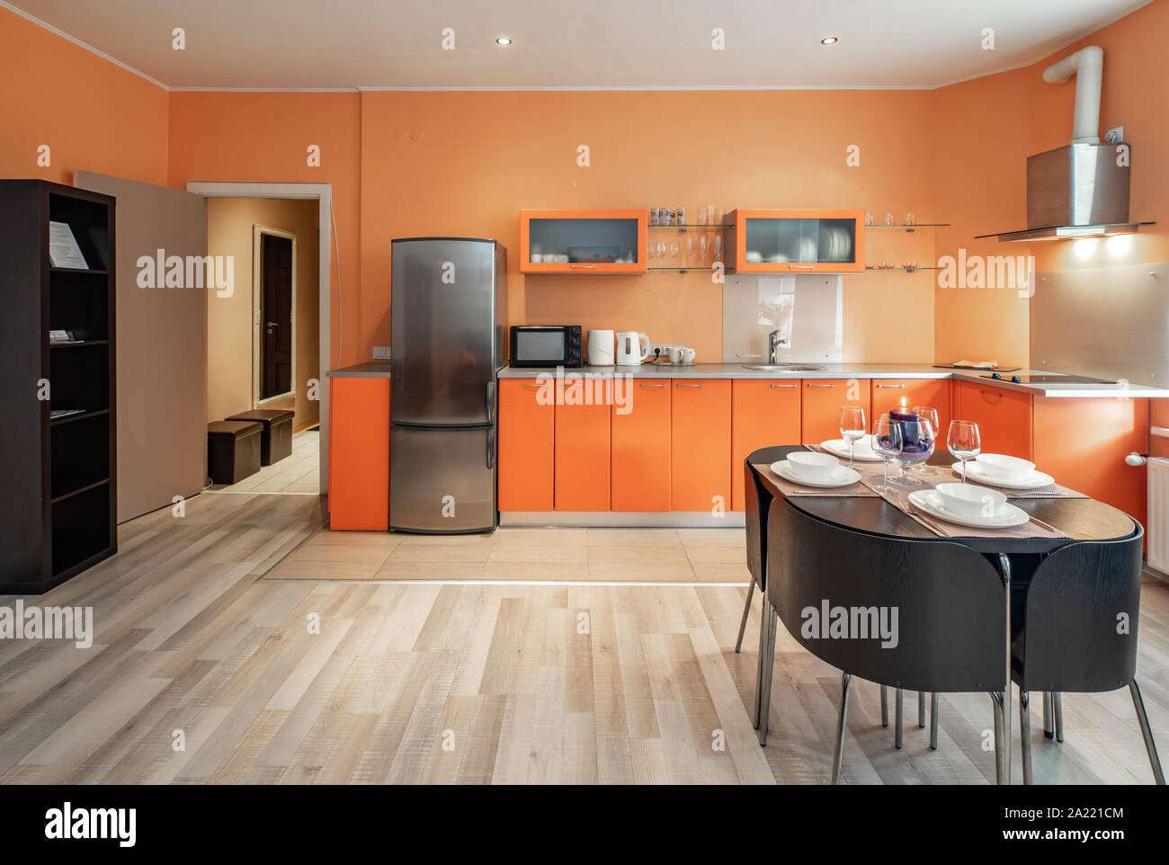 Studio apartment with furniture. Kitchen set. Served table Stock Photo ...