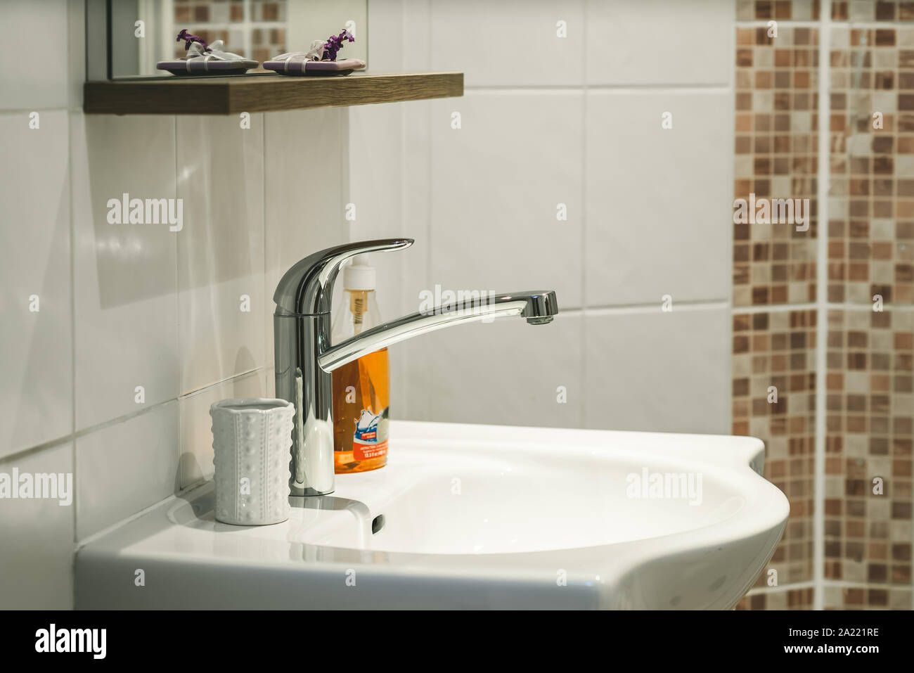 Bathroom interior. White sink. White tile Stock Photo - Alamy